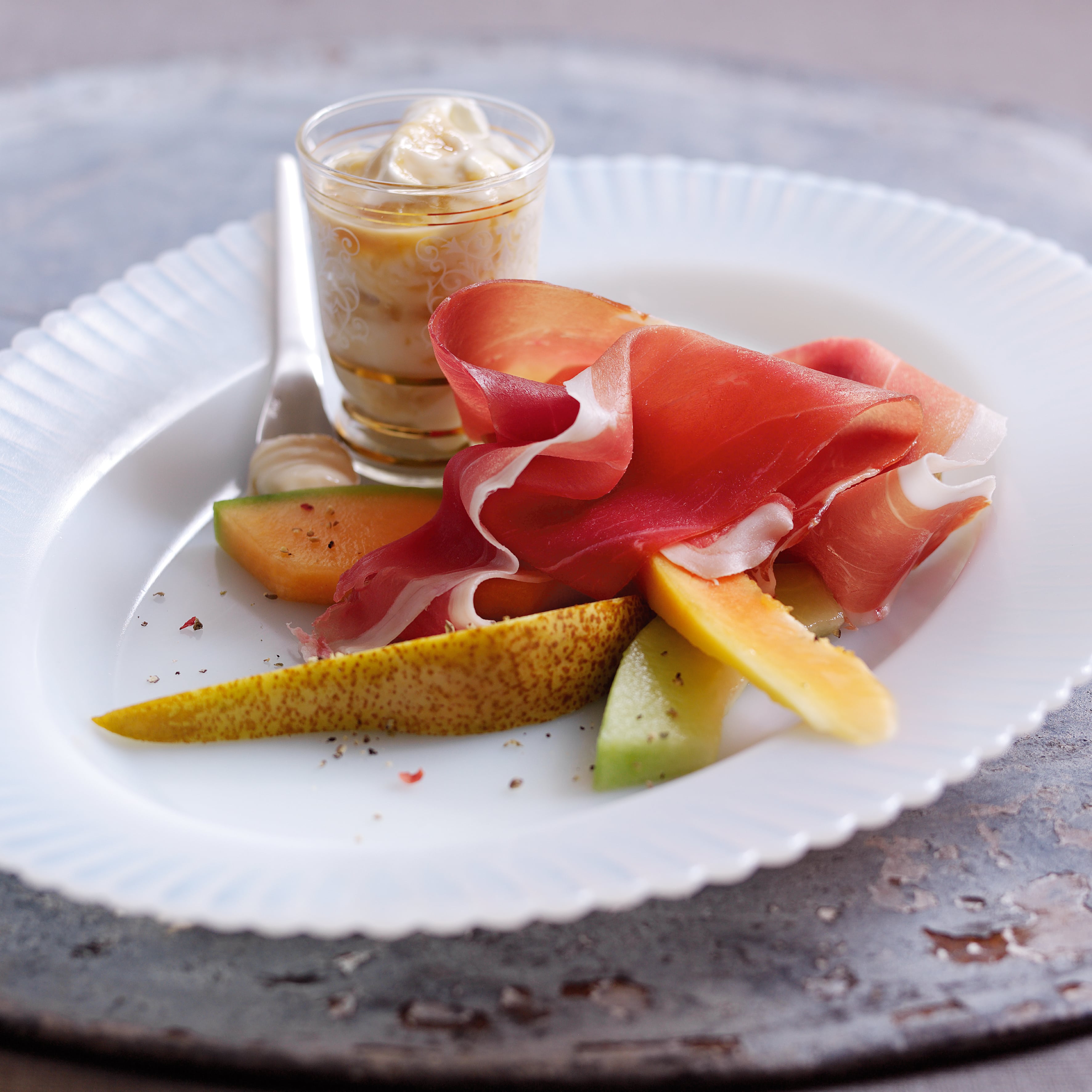 Parma Ham fruit platter with ginger and honey dressing
