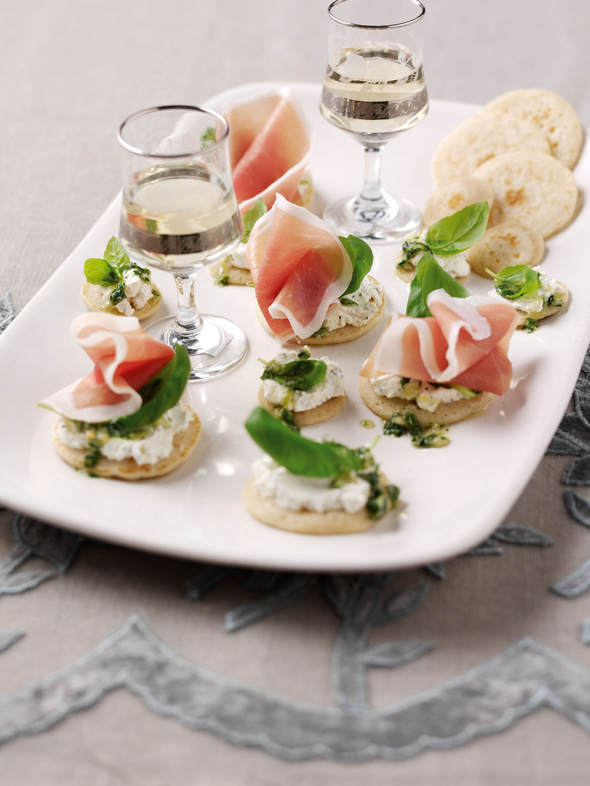 Parma Ham, peppered cream-cheese blinis with homemade pesto | Consorzio ...